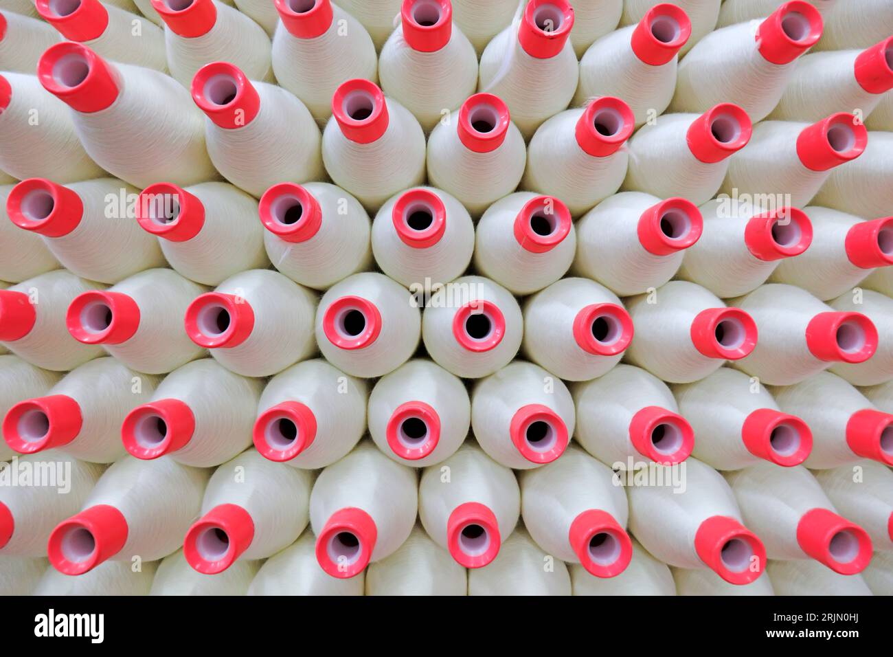 Cotton yarn ball on production line Stock Photo - Alamy
