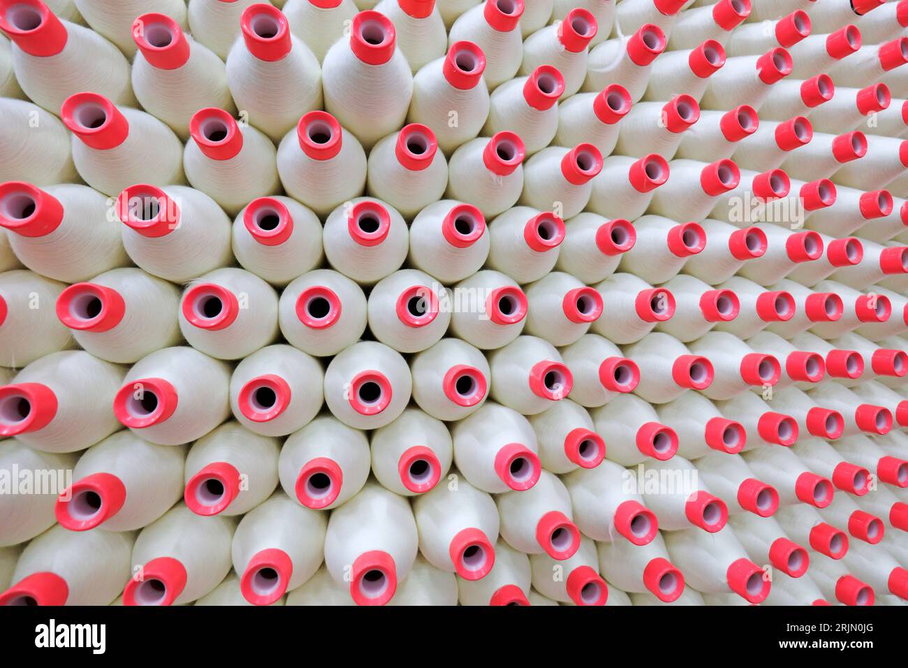 Cotton yarn ball on production line Stock Photo - Alamy