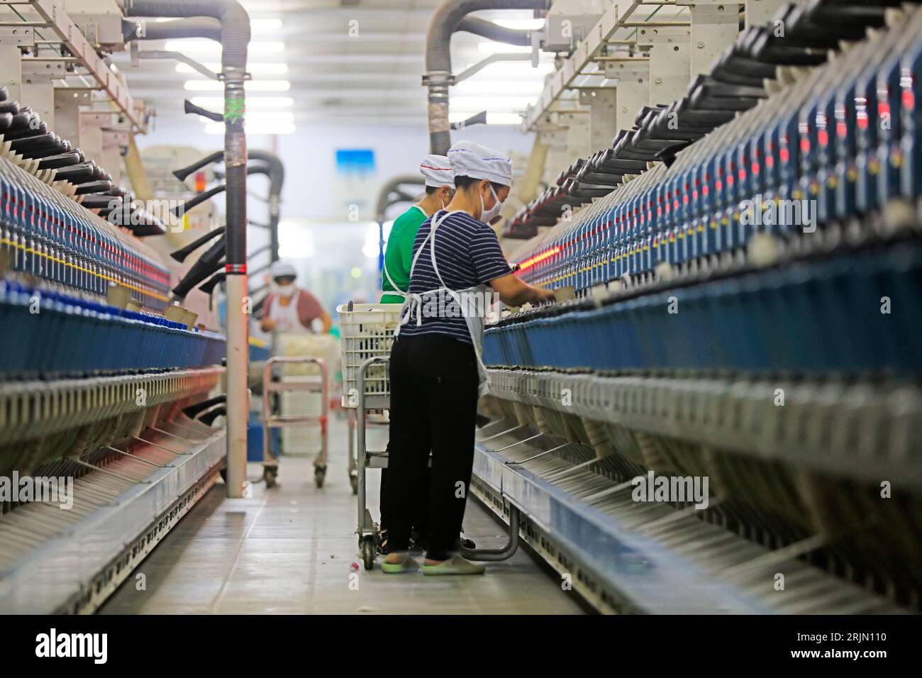 Automated technology production textile factory hi-res stock ...