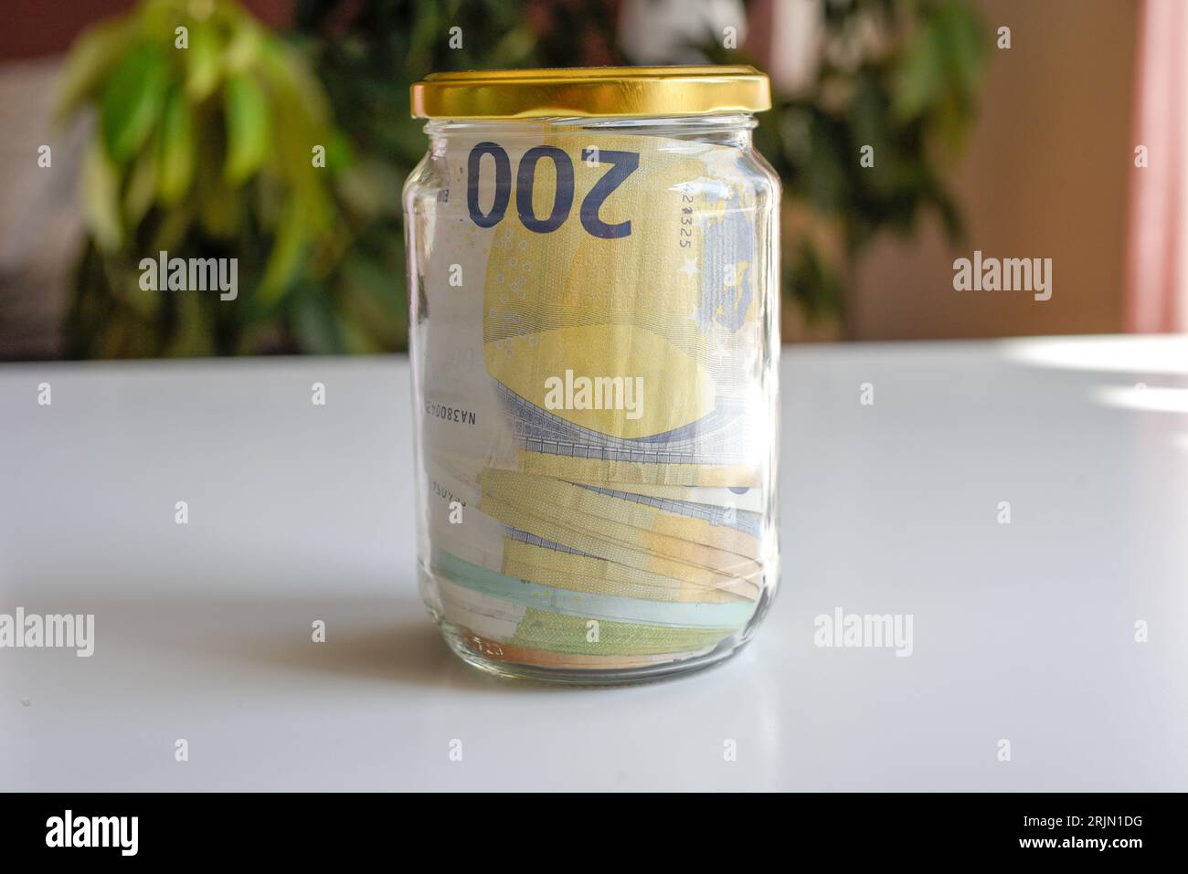 A mound of paper money on a white background, arranged in a stack Stock ...