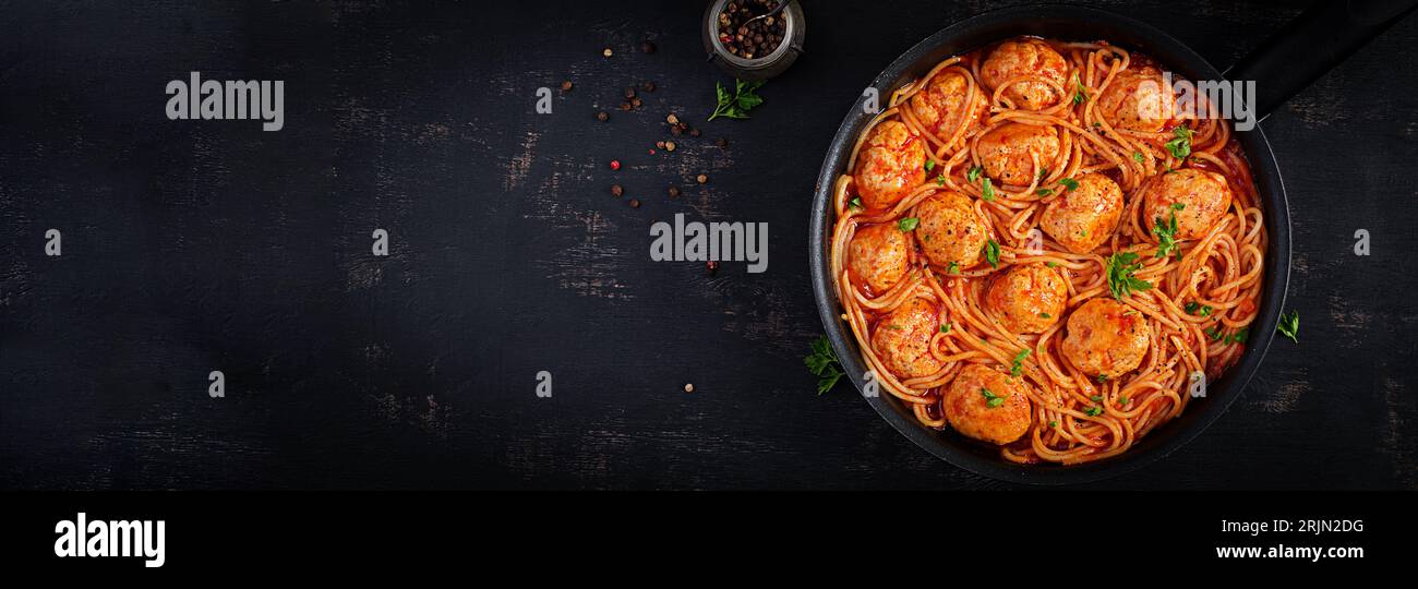 Spaghetti pasta with meatballs in tomato sauce. Italian pasta. Top view ...
