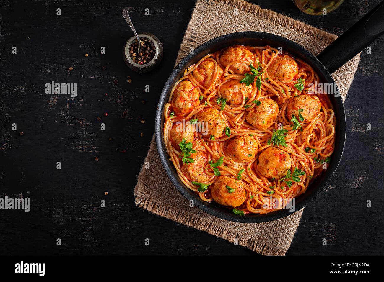 Spaghetti pasta with meatballs in tomato sauce. Italian pasta. Top view ...