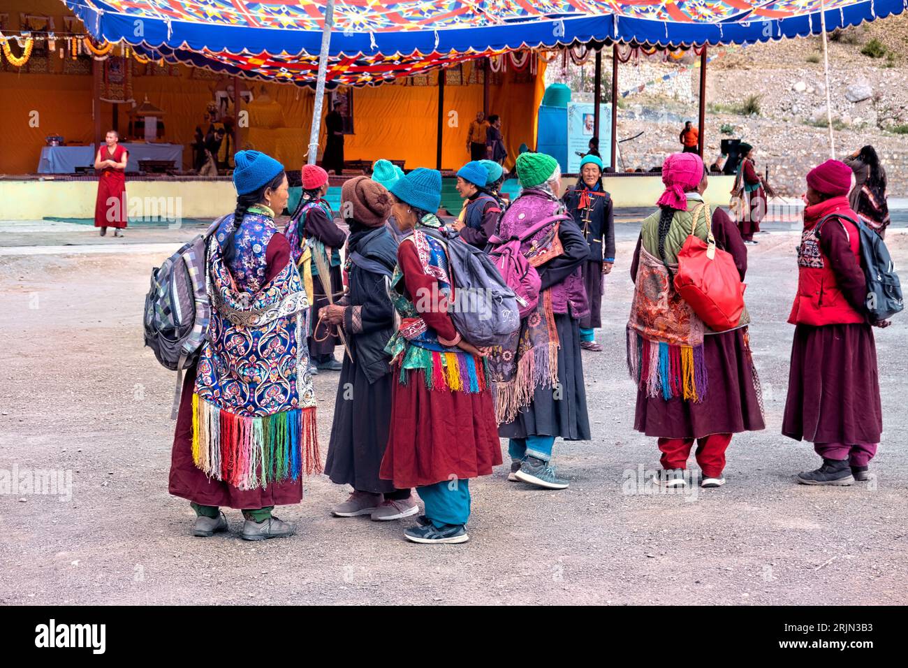 Ladakhi women in traditional clothing (perak headdress) at a high lama ...