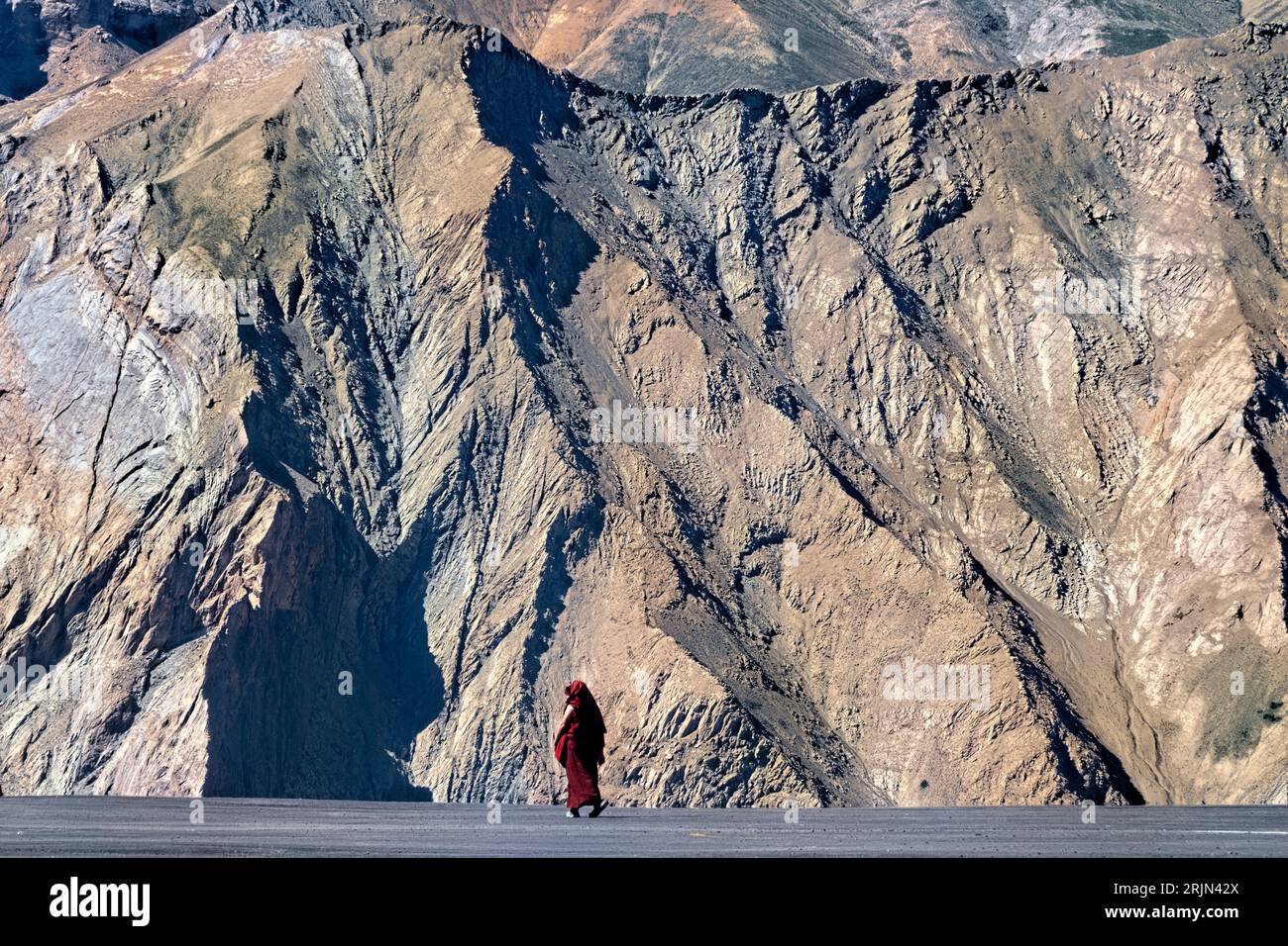 Monk under the mountain, Lingshed, Zanskar, Ladakh, India Stock Photo ...