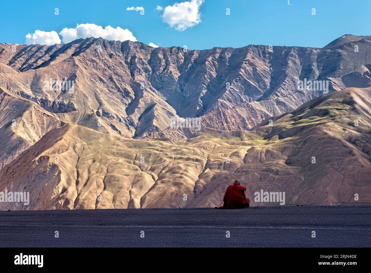 Monk under the mountain, Lingshed, Zanskar, Ladakh, India Stock Photo ...