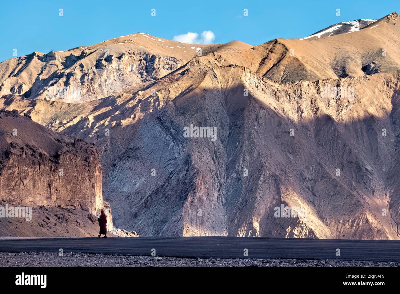 Monk under the mountain, Lingshed, Zanskar, Ladakh, India Stock Photo ...