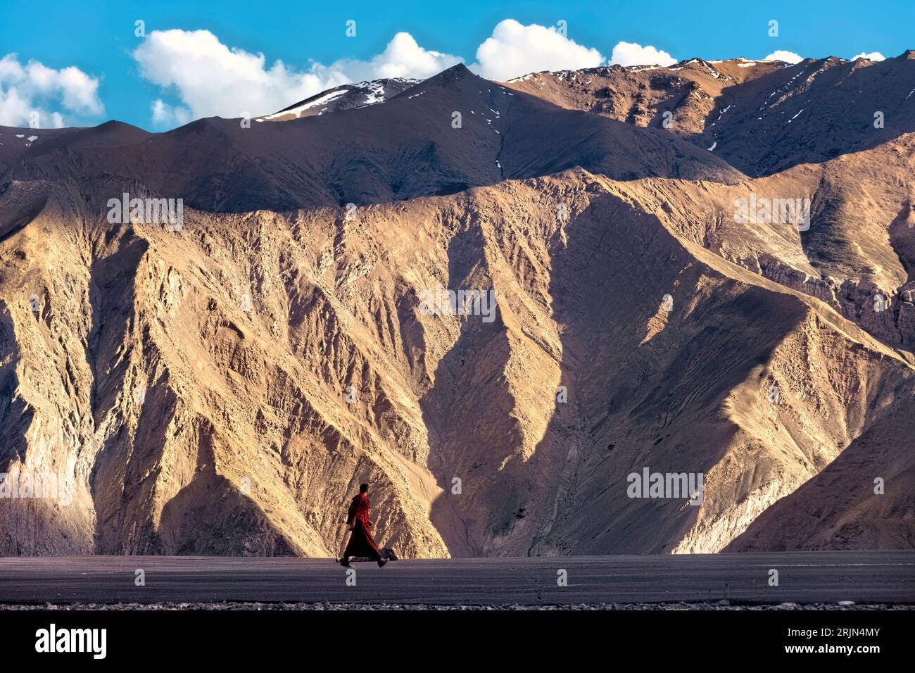 Monk under the mountain, Lingshed, Zanskar, Ladakh, India Stock Photo ...