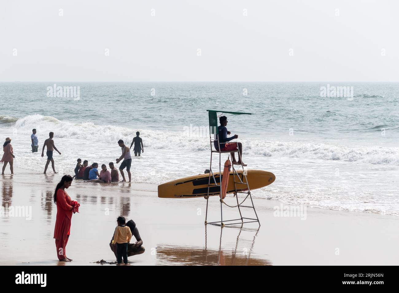 Calangute, Goa, India - January 2023: A lifeguard watching over a crowd ...