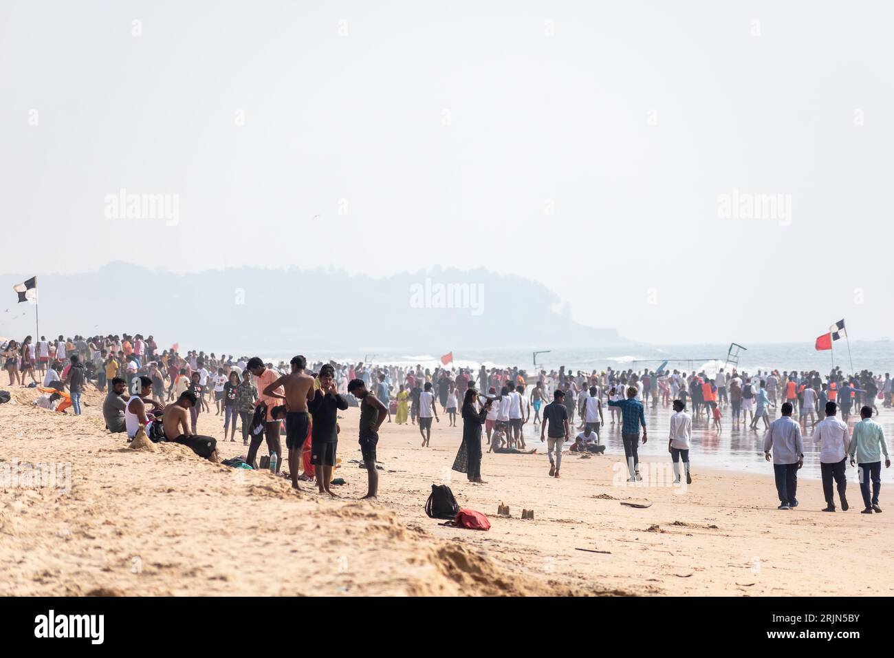 Calangute, Goa, India - January 2023: The crowded beach full of Indian ...