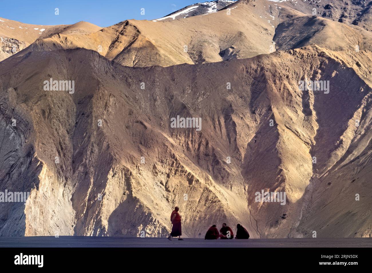 Monks under the mountain, Lingshed, Zanskar, Ladakh, India Stock Photo ...