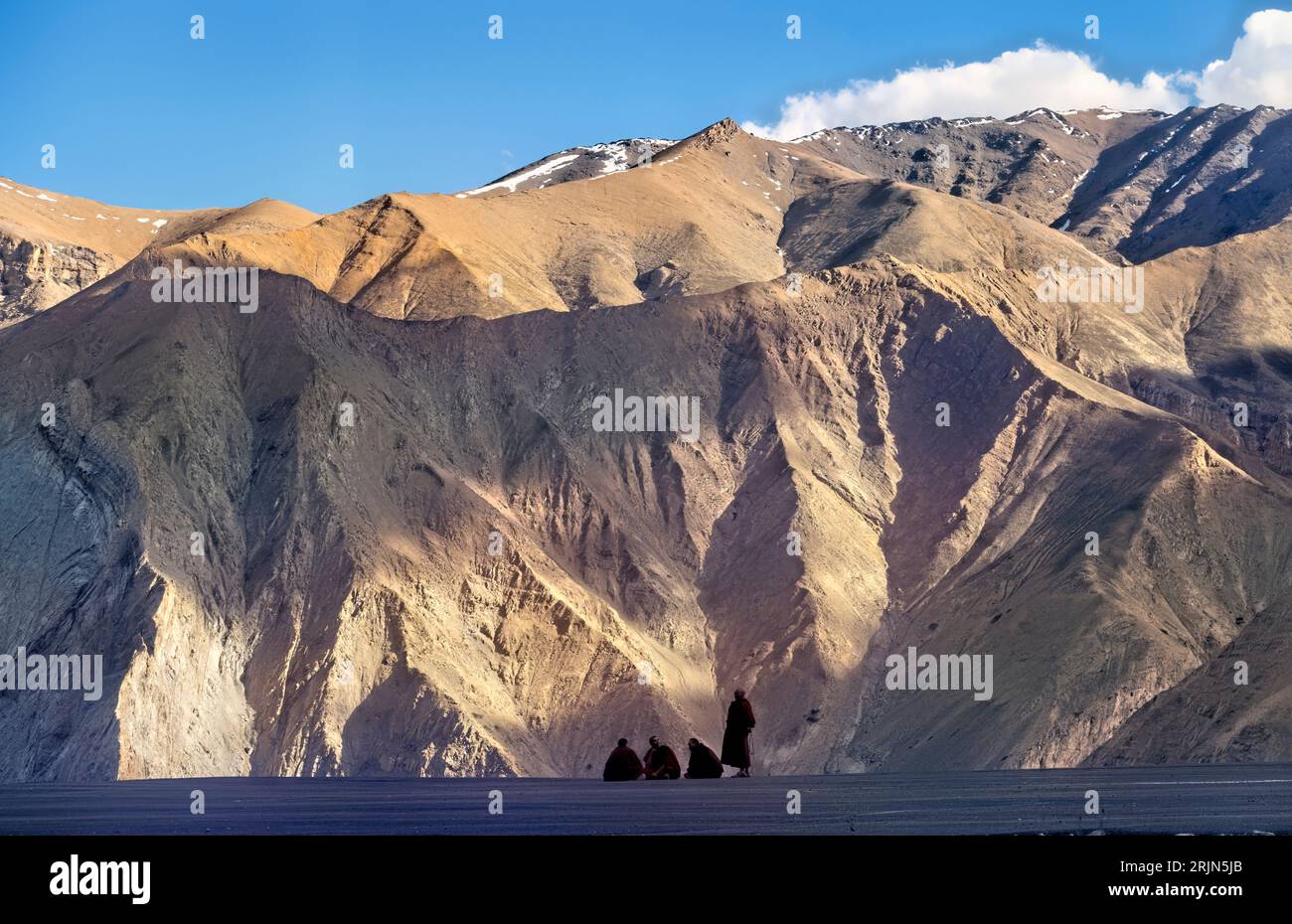 Monks under the mountain, Lingshed, Zanskar, Ladakh, India Stock Photo ...
