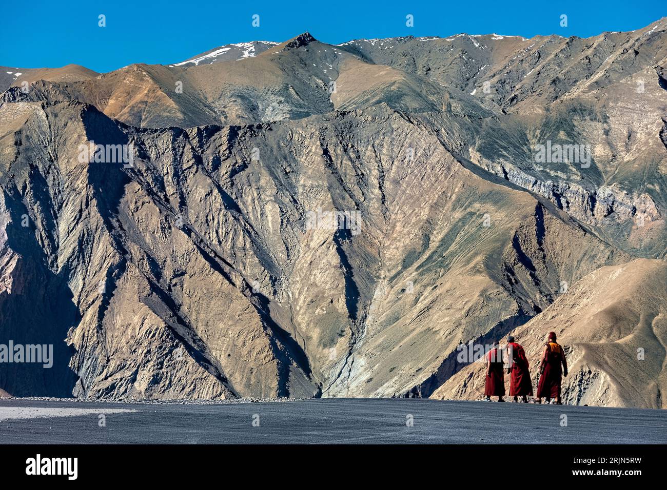 Monks under the mountain, Lingshed, Zanskar, Ladakh, India Stock Photo ...