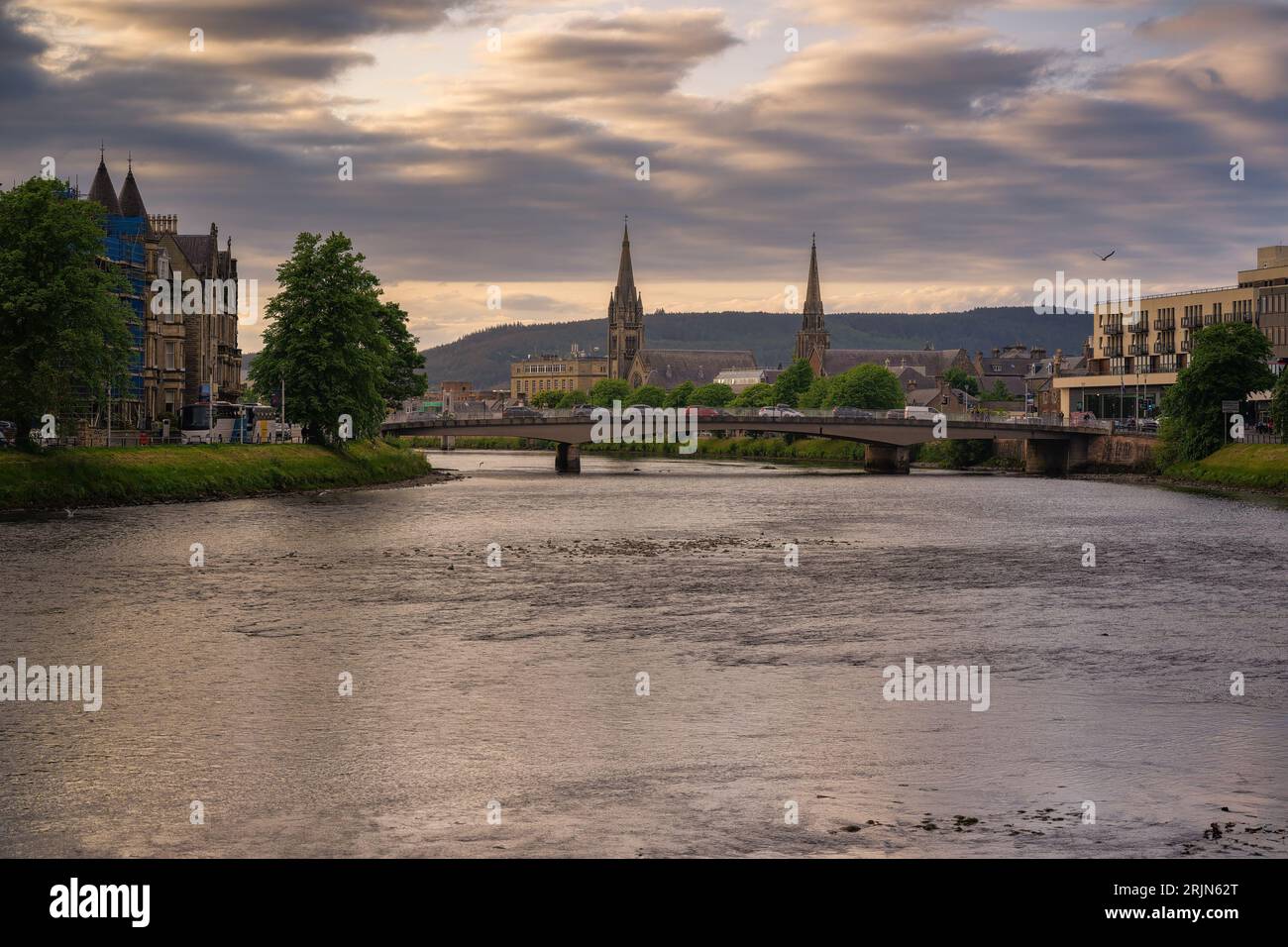 The river Ness flowing through inverness Scotland against the sunset ...