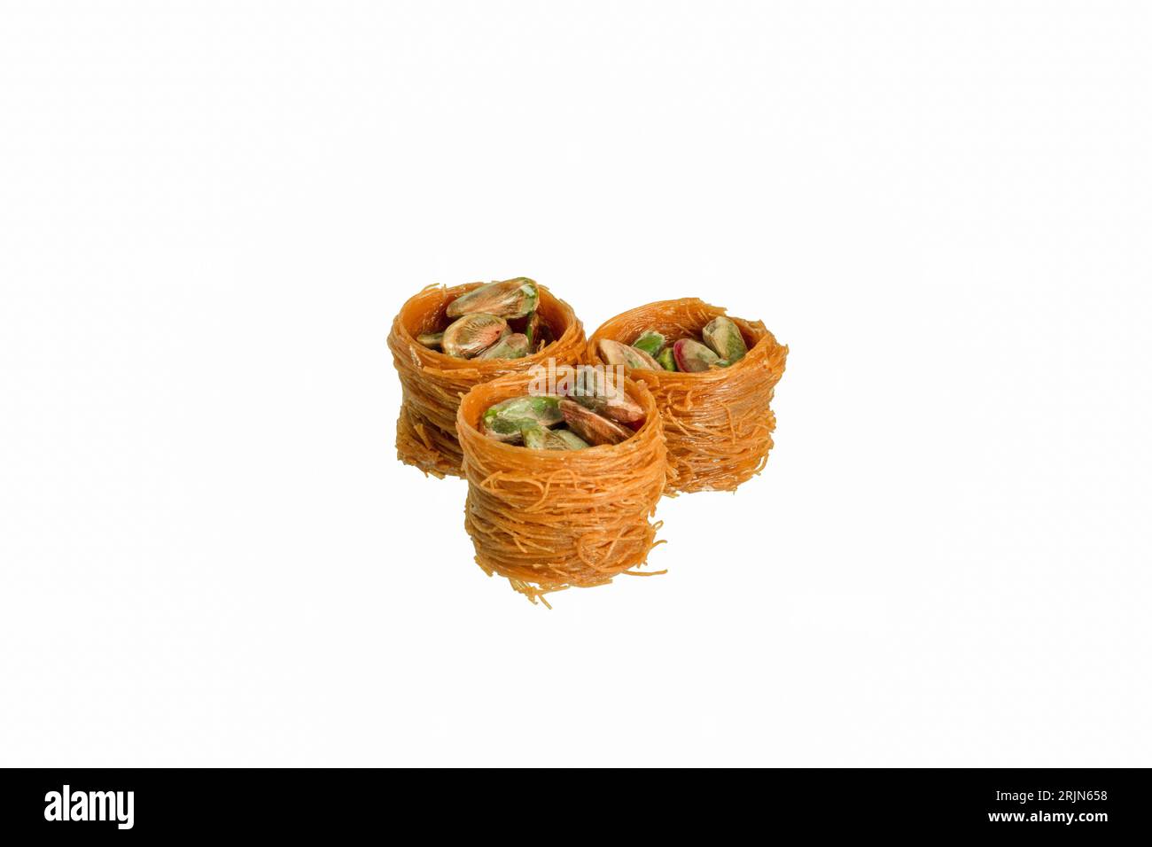 Syrian Turkish sweet (Ish Al Boulbol or Taj AL Malek) isolated on white ...