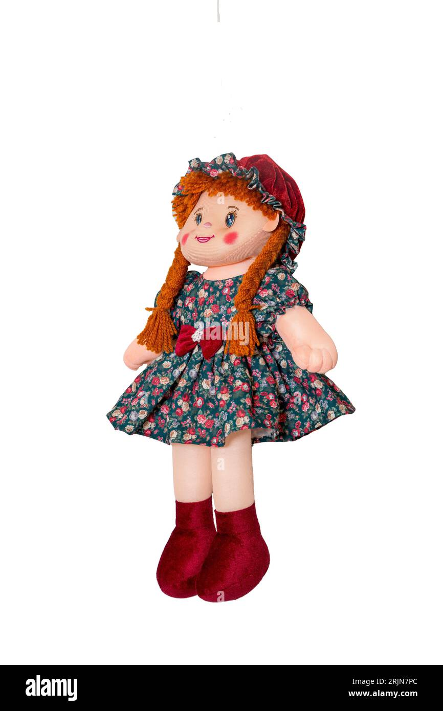 An adorable homemade plush doll with orange, braided hair Stock Photo ...