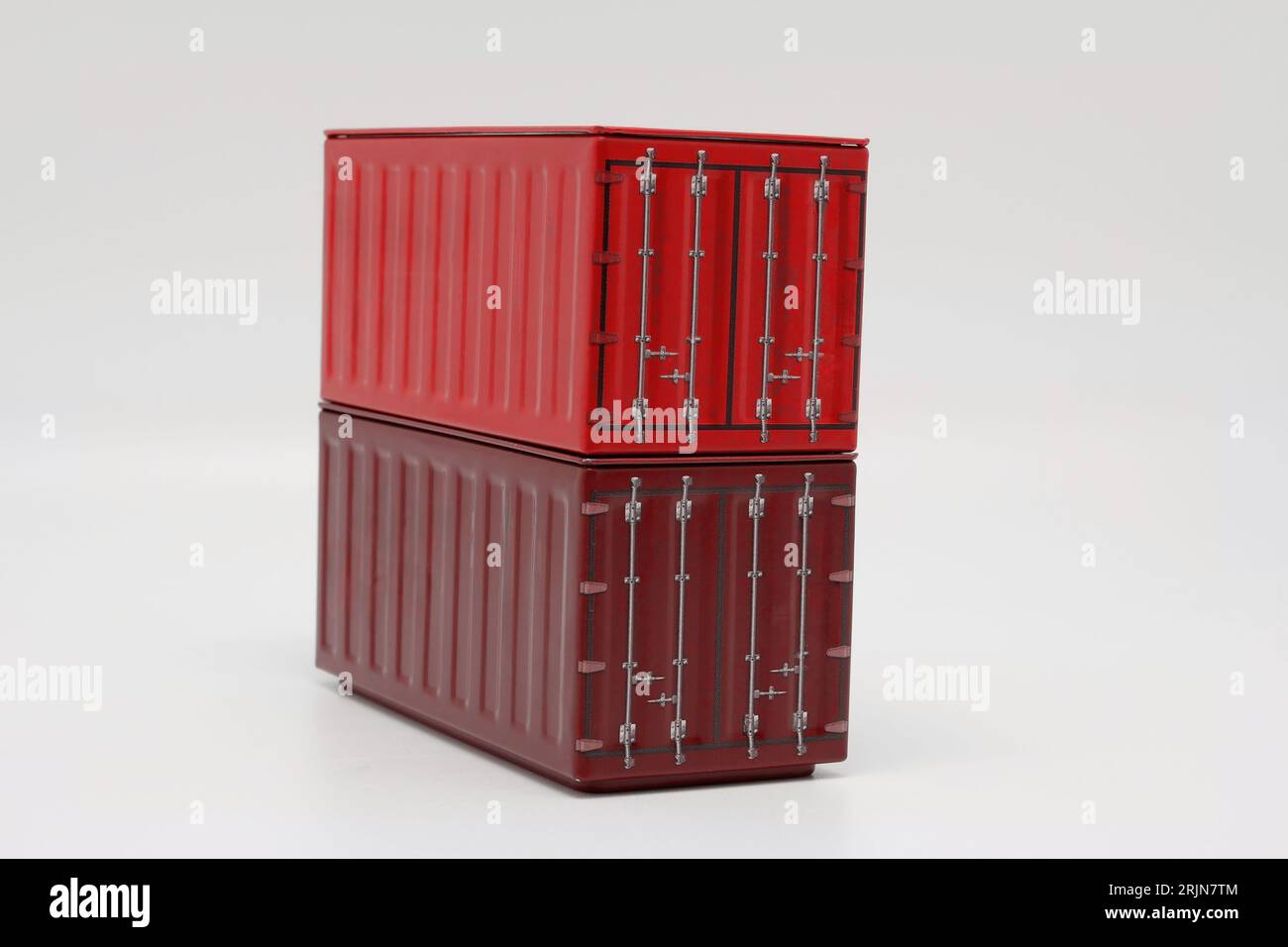 A stack of red shipping containers against a white background Stock ...