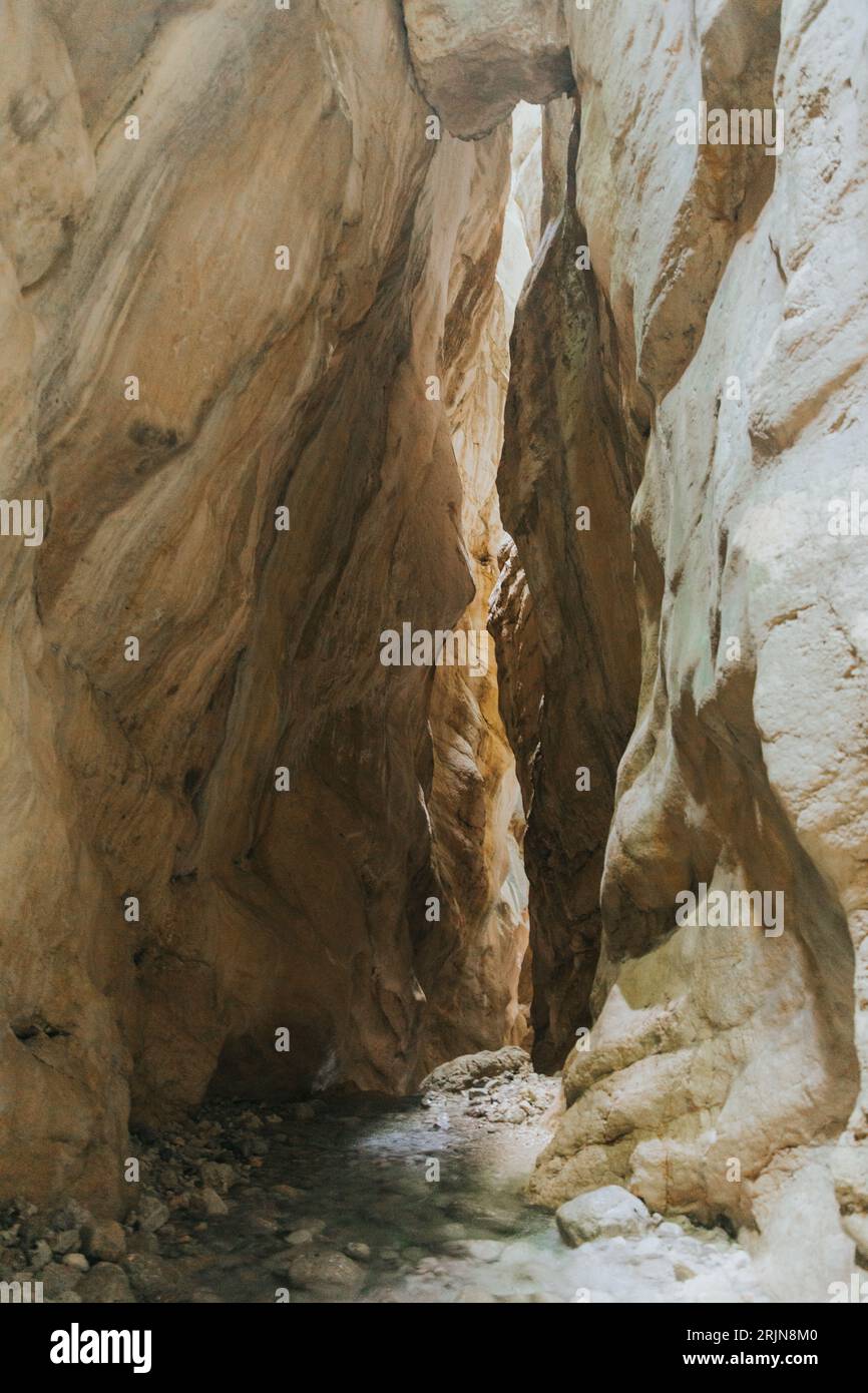 A rocky mountain path, winding its way through a narrow section of the ...