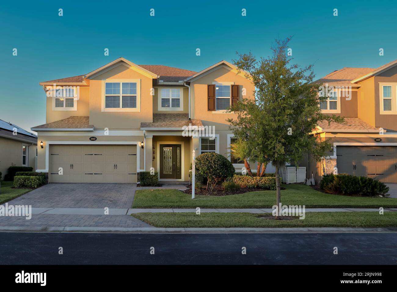 Cozy two story houses hi-res stock photography and images - Alamy