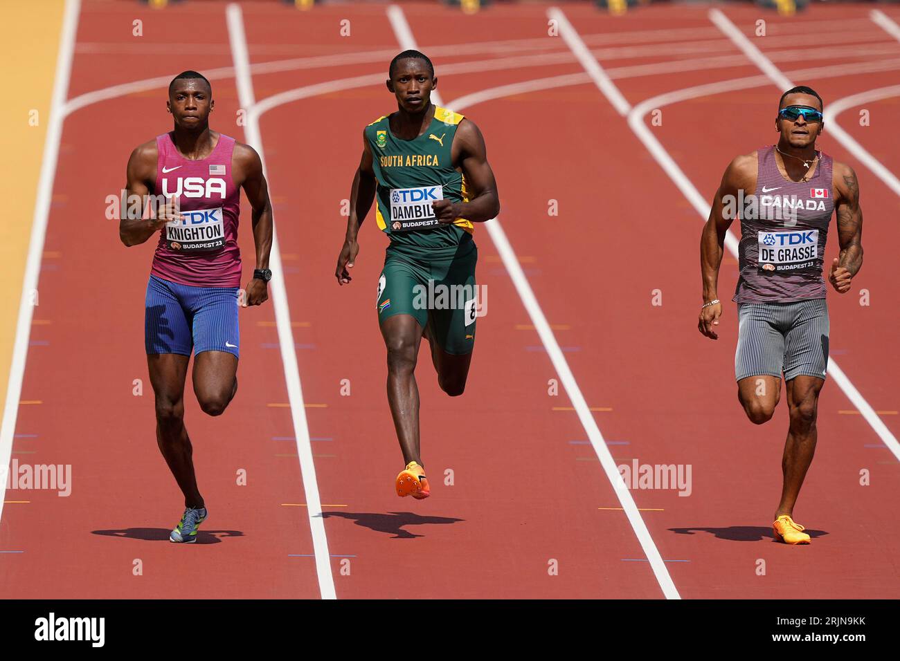 Erriyon Knighton, of the United States, left, wins in the Men's 200 ...