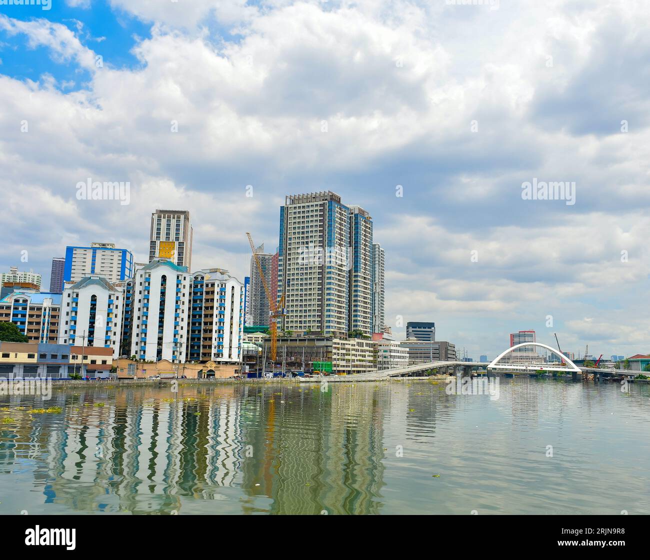 The Pasig River in Manila, the Philippines, with Intramuros Bridge in ...