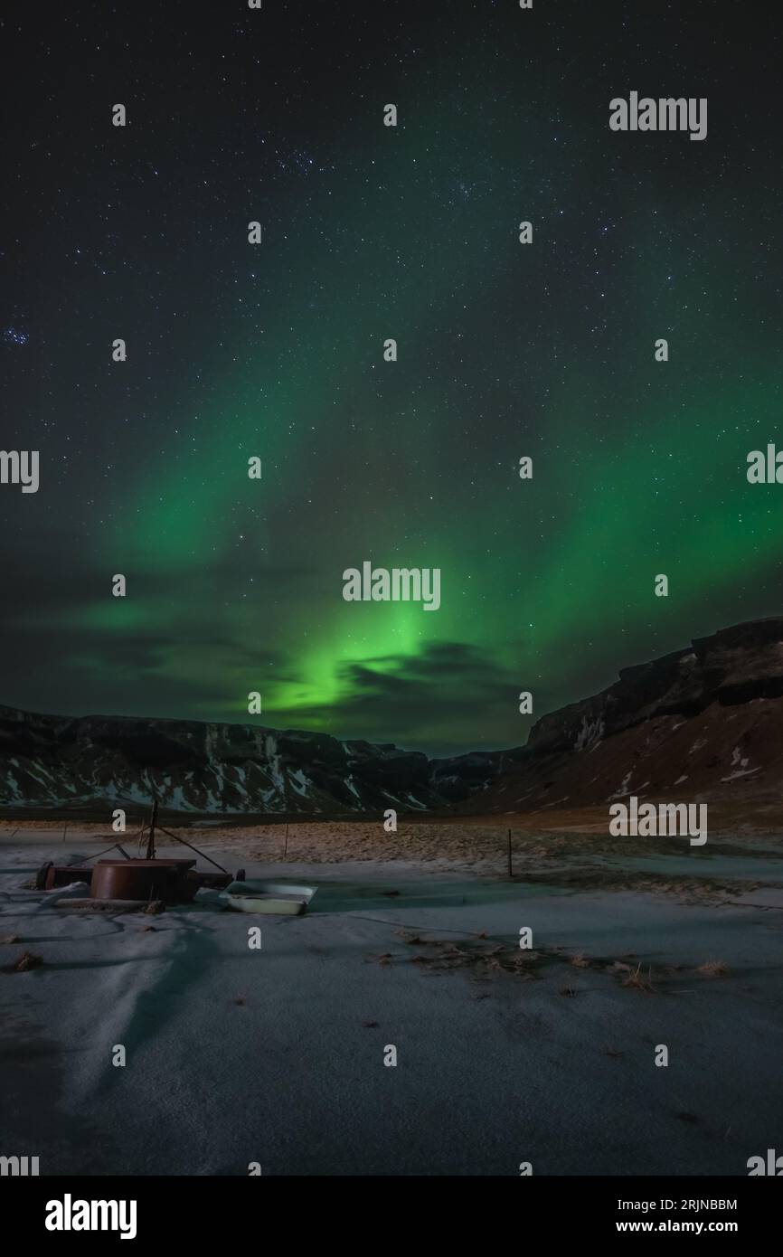 A breathtaking view of the aurora borealis in the night sky above ...