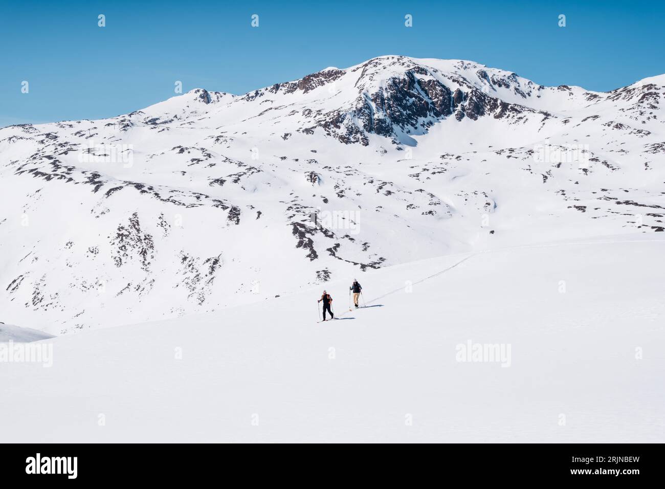 A breathtaking winter scene featuring adventurers in Italy's Val ...