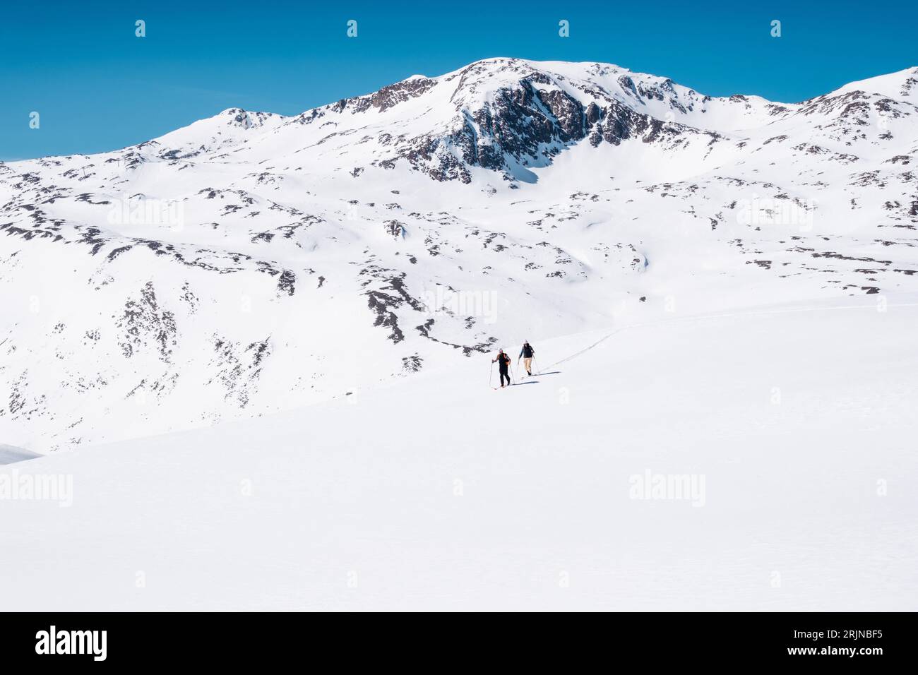 A breathtaking winter scene featuring adventurers in Italy's Val ...