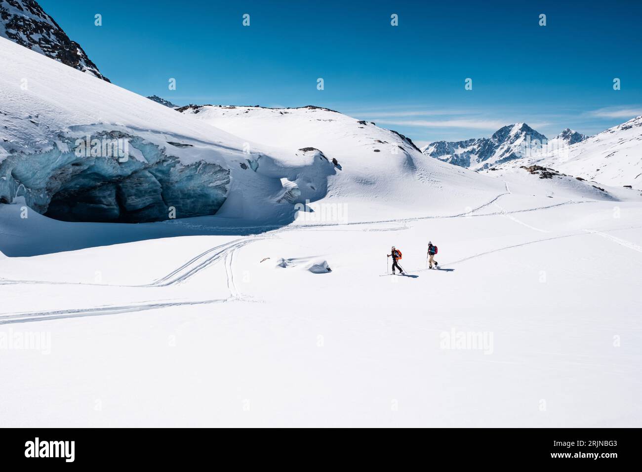 A breathtaking winter scene featuring adventurers in Italy's Val ...