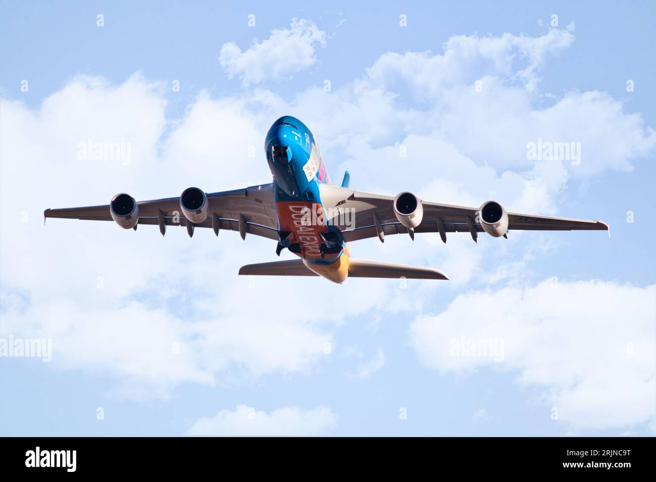 The Special Dubai A380 EXPO plane flying in the blue sky Stock Photo ...