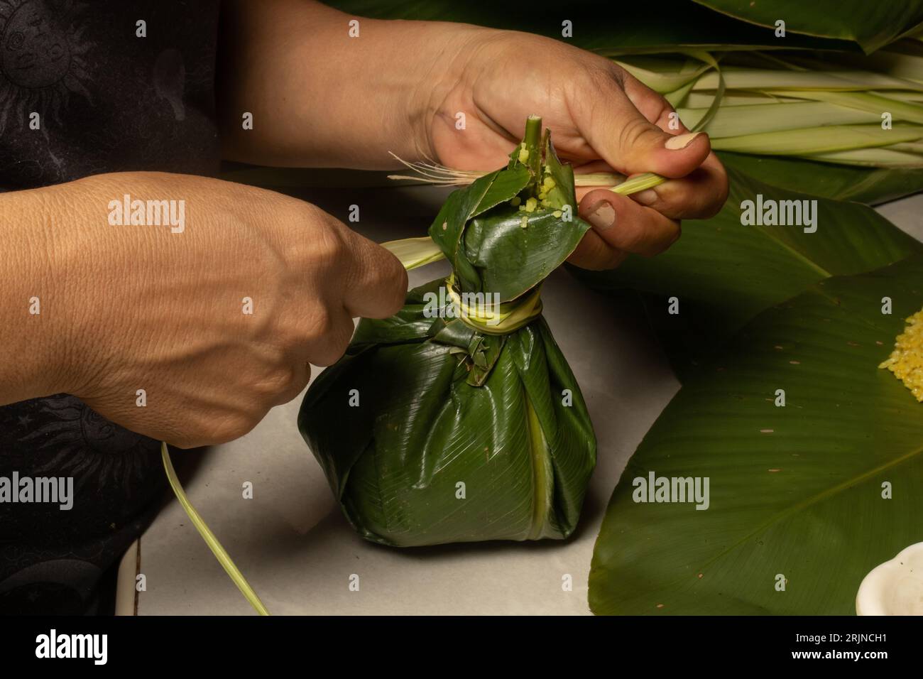 A closeup of Juane, traditional Peruvian food of chicken wrapped in ...