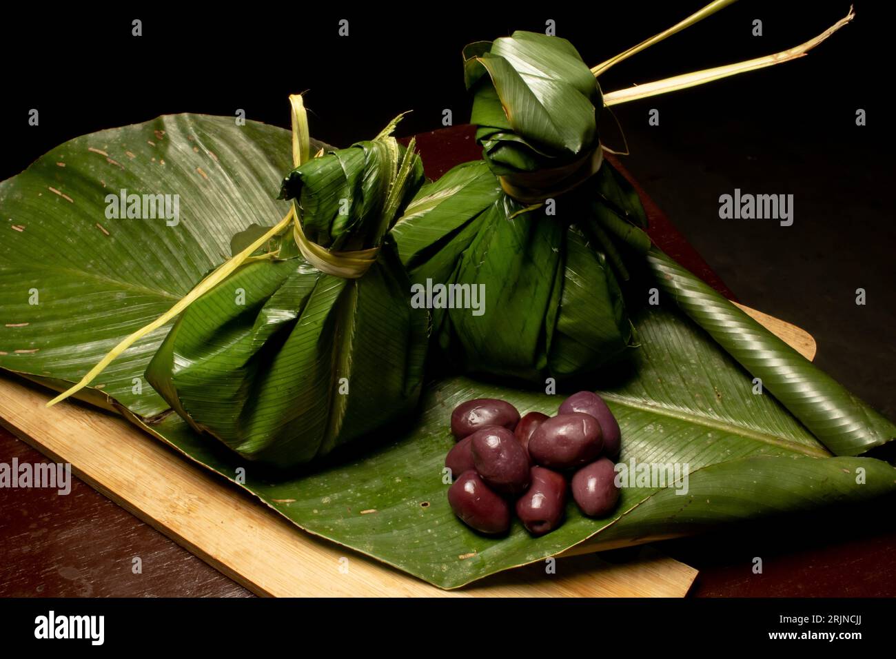 A closeup of Juane, traditional Peruvian food of chicken wrapped in ...