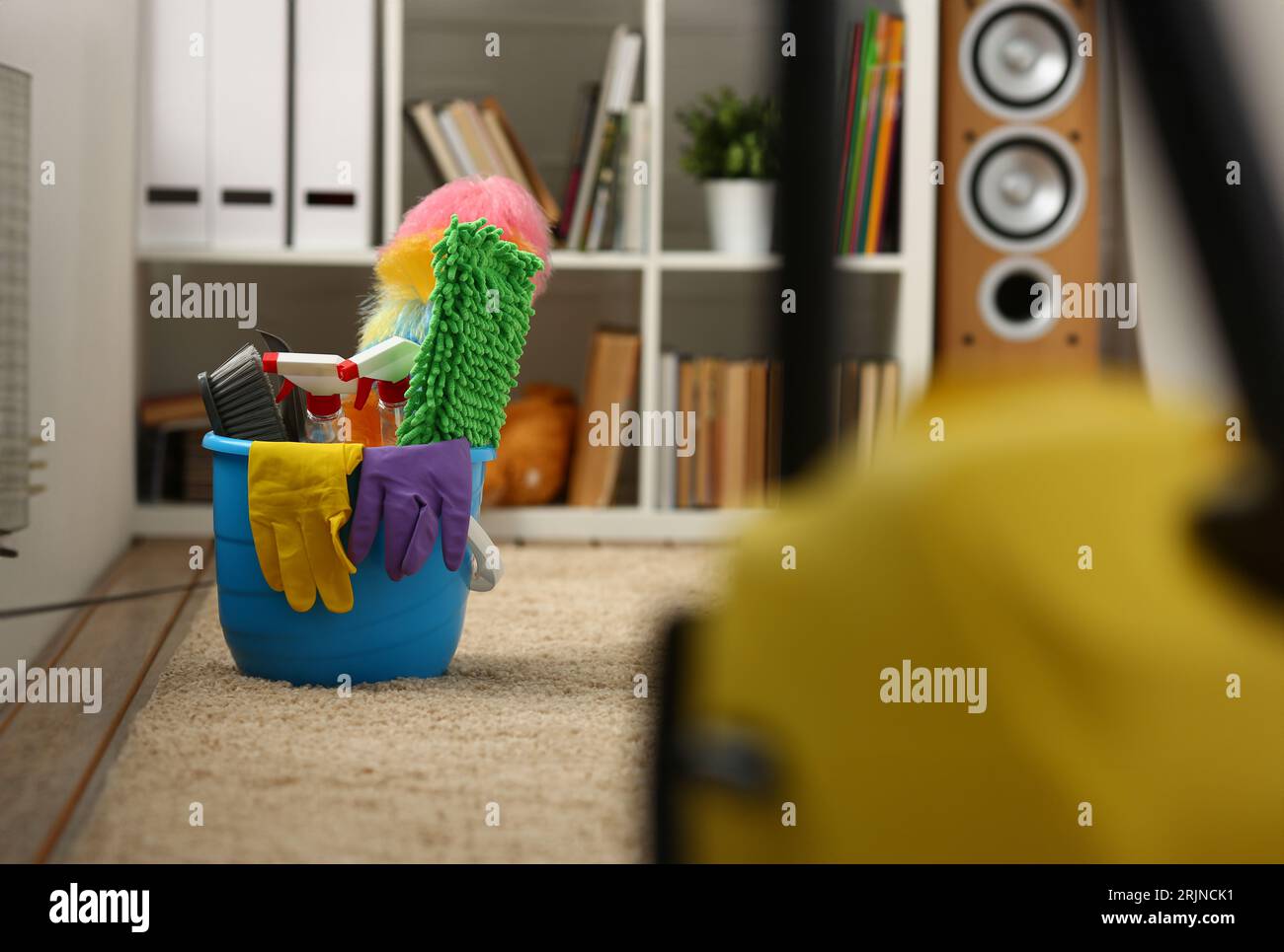 A bucket with cleaning equipment stands Stock Photo - Alamy