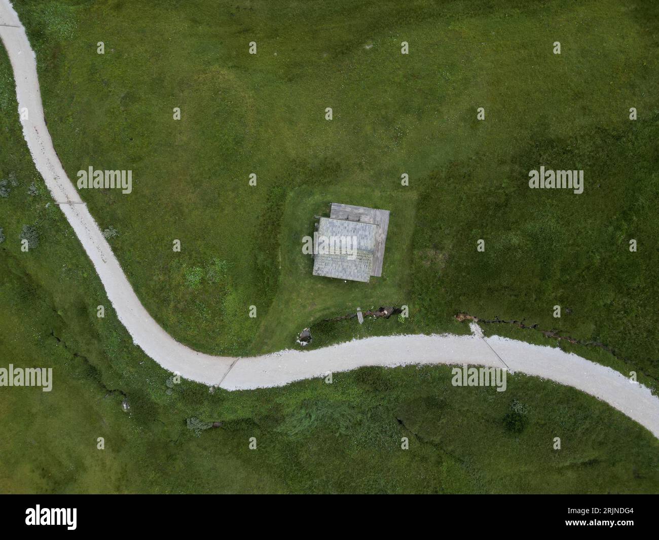 Wooden hut on An Aerial view of Armentarola fields Dolomites Alps near ...