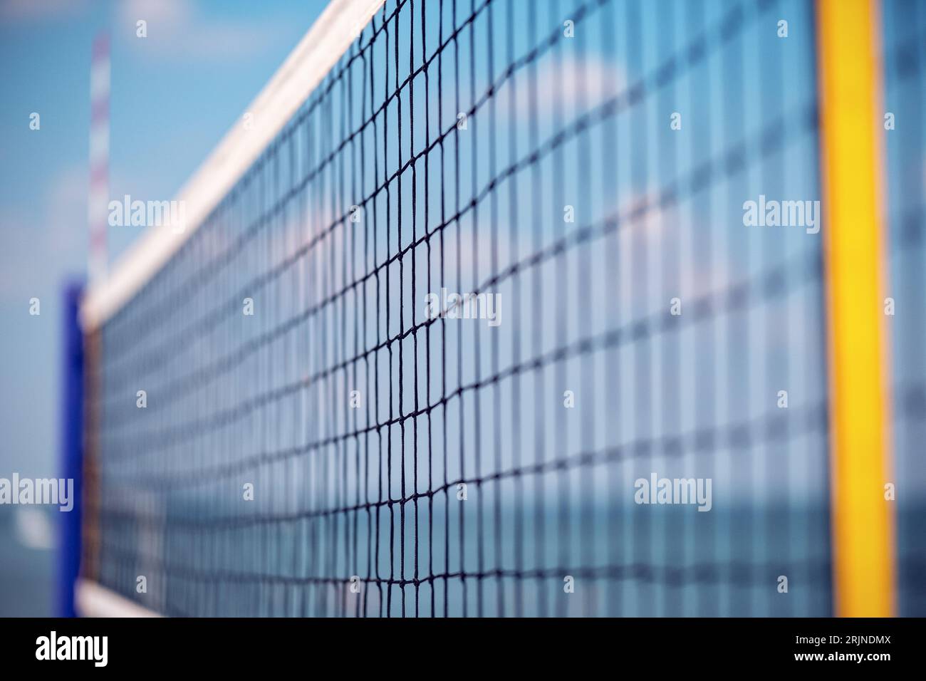 Volleyball net on the beach close-up against the blue sky Stock Photo ...
