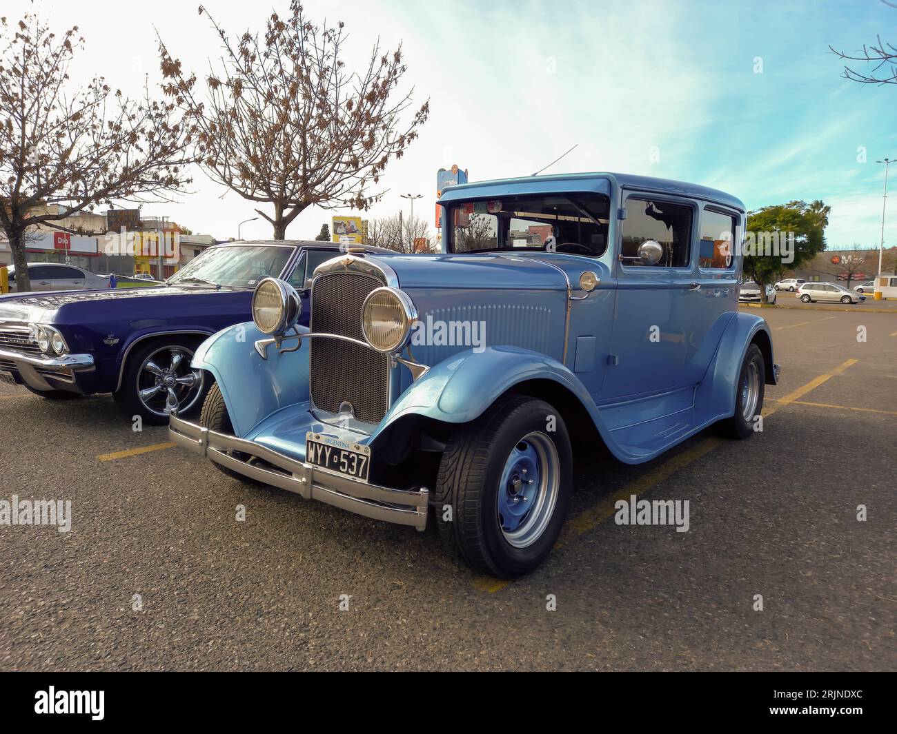 Old blue early 1930s Dodge Brothers Six two door sedan street rod in a ...