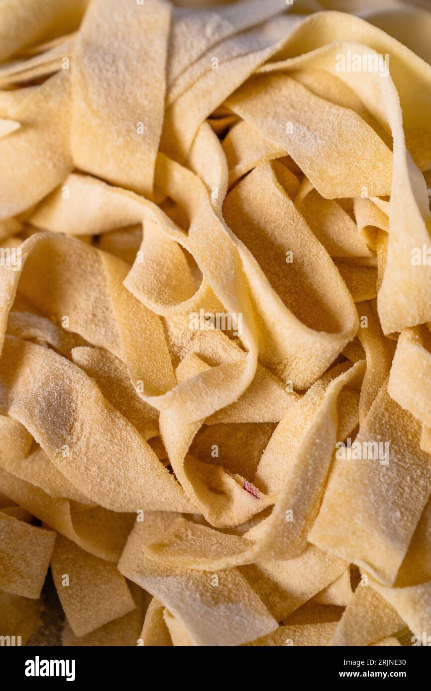 Traditional process making italian pappardelle hi-res stock photography ...