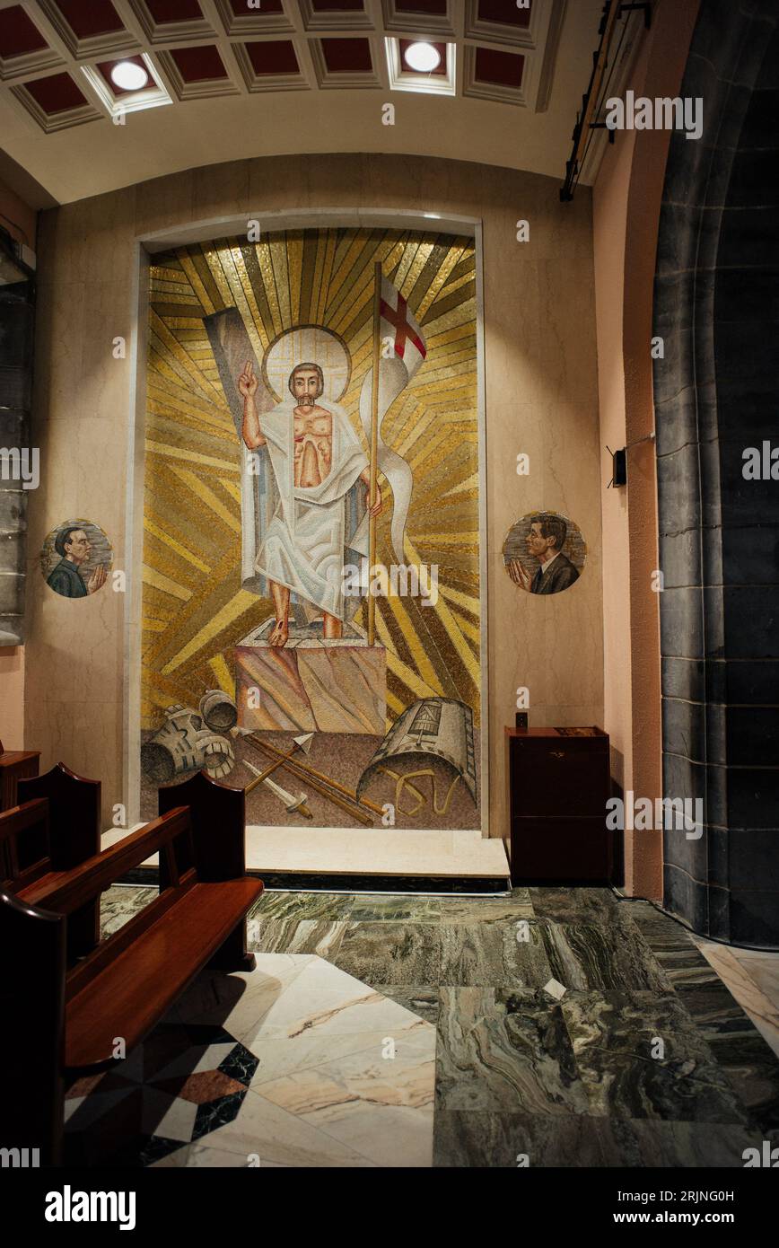 A church interior featuring an ornate wall depicting the resurrection of Jesus Christ Stock ...