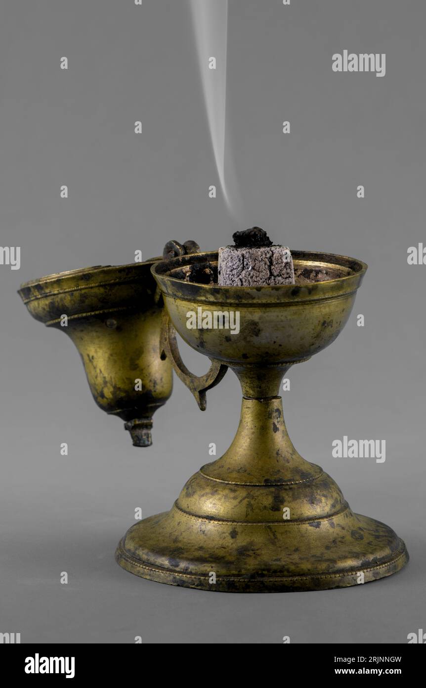 Burning fragrant incense hi-res stock photography and images - Alamy