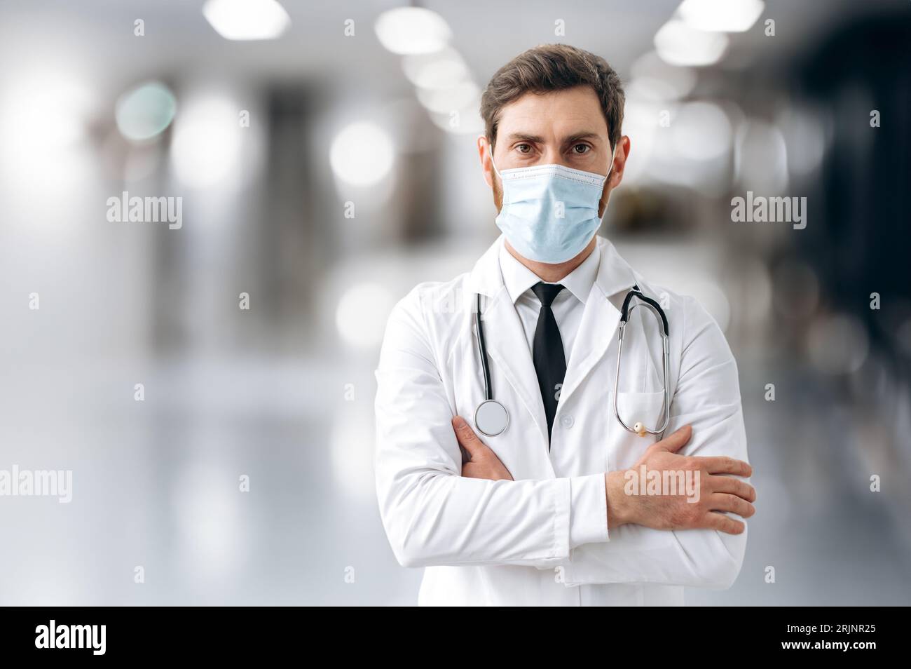 Photo of a caucasian proud male doctor, therapist, surgeon ...