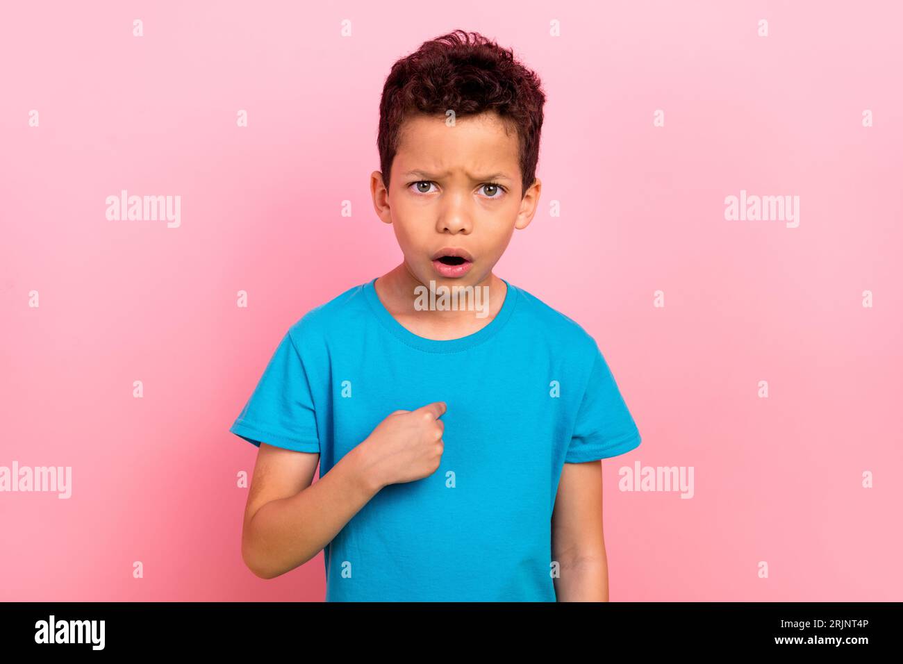 Photo of impressed stressed little boy dressed blue t-shirt pointing ...