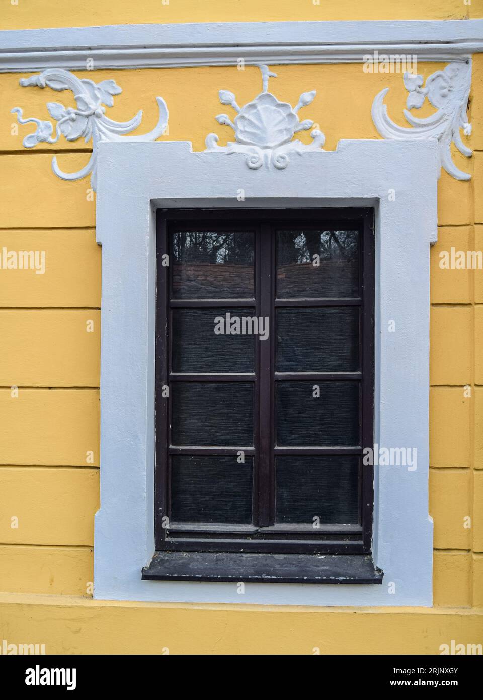 Yellow old window in the historical center of Prague in the Czech ...