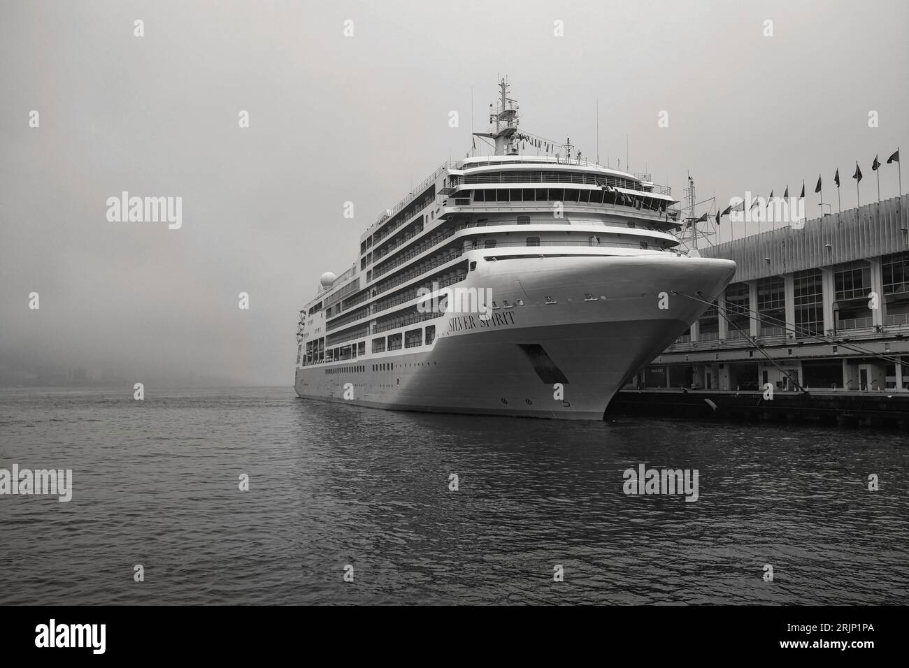 The cruise ship Silver Spirit is in port in Hong Kong. Raining and ...