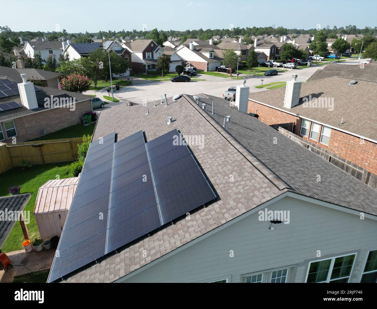 An aerial view of suburban homes in a residential neighborhood with ...