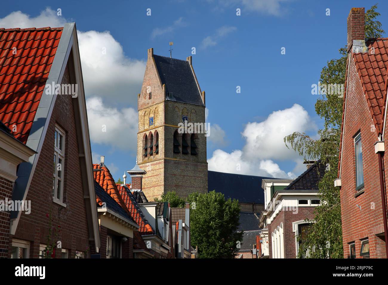The bell tower of Martinikerk (St Martin church) viewed from Kerkstraat ...