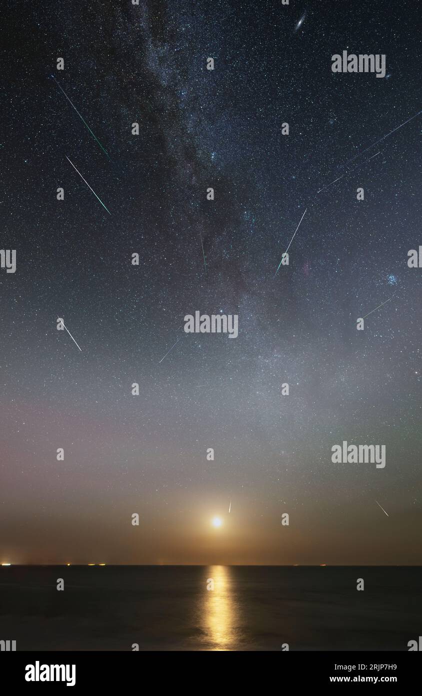 The Perseid meteor shower pictured with a rising moon over a Norfolk ...