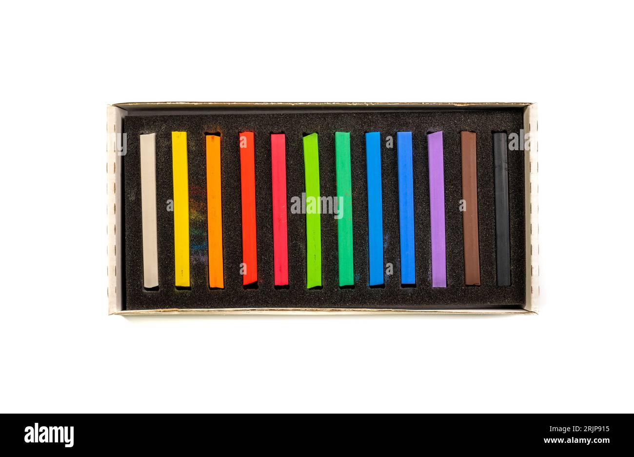 A set of soft pastel sticks in a box on a white background Stock Photo ...