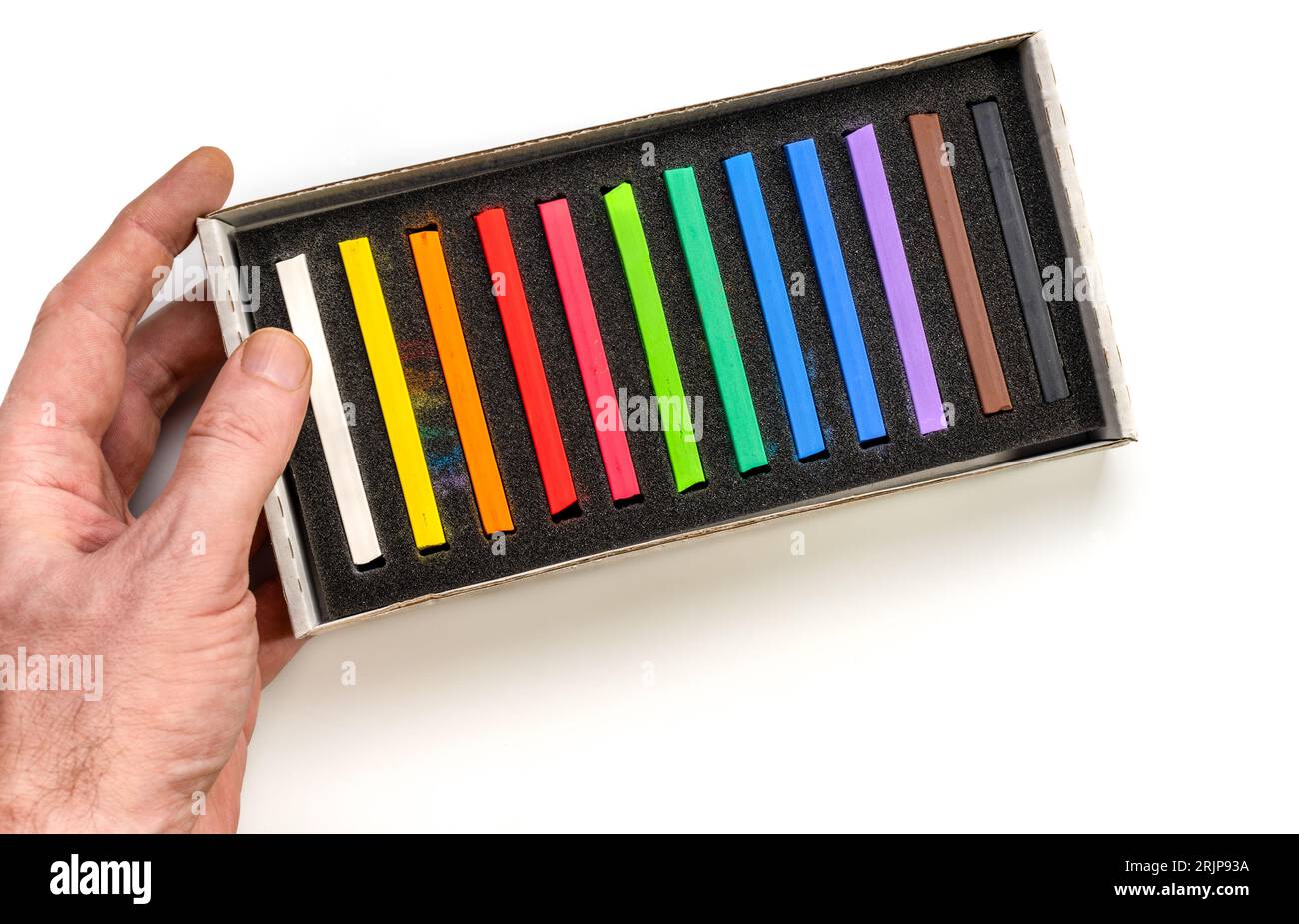 A set of soft pastel sticks in a box on a white background Stock Photo ...