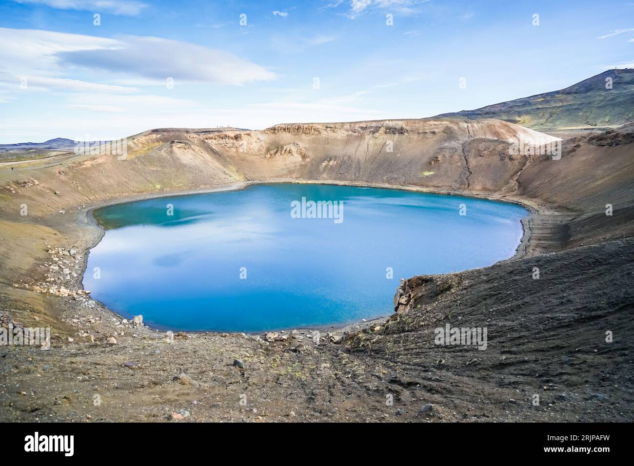 A stunning aerial view of an isolated crater in a wilderness landscape ...