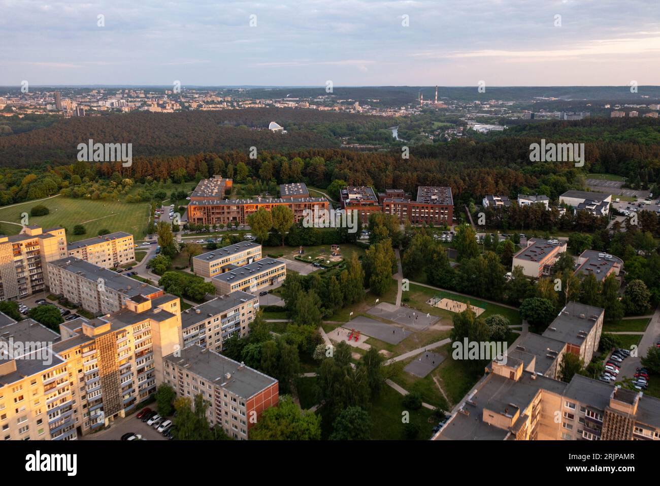 Drone photography of apartment flat complex in a city near a big park ...