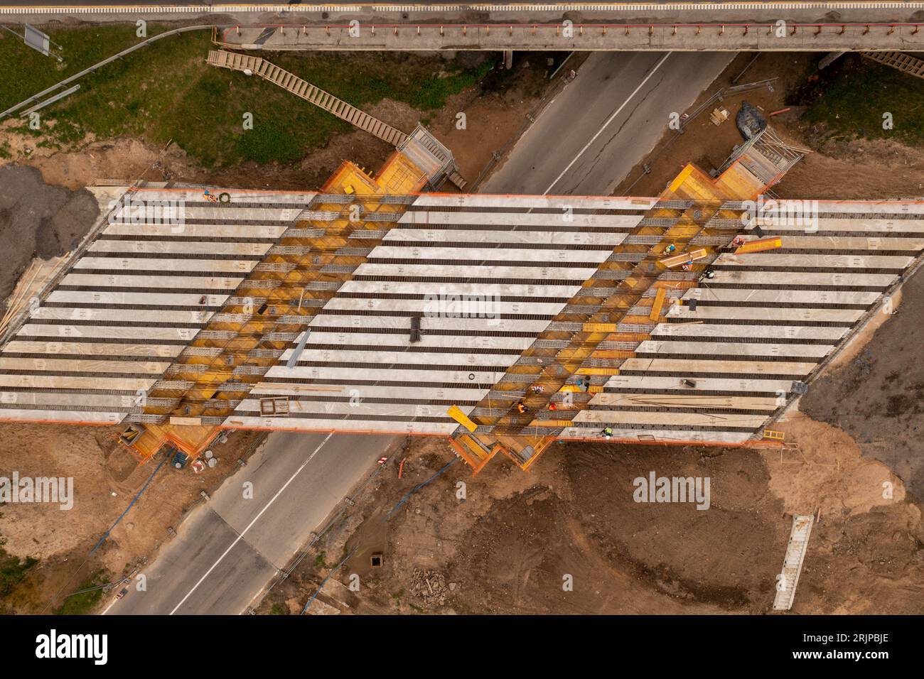 Drone photography of highway bridge being built during spring day. High ...